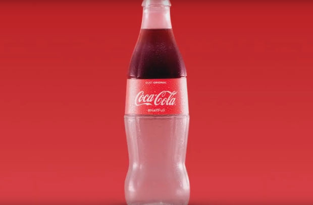 Coca-Cola Romania Encourages Positivity with Half-Full Bottles | LBBOnline